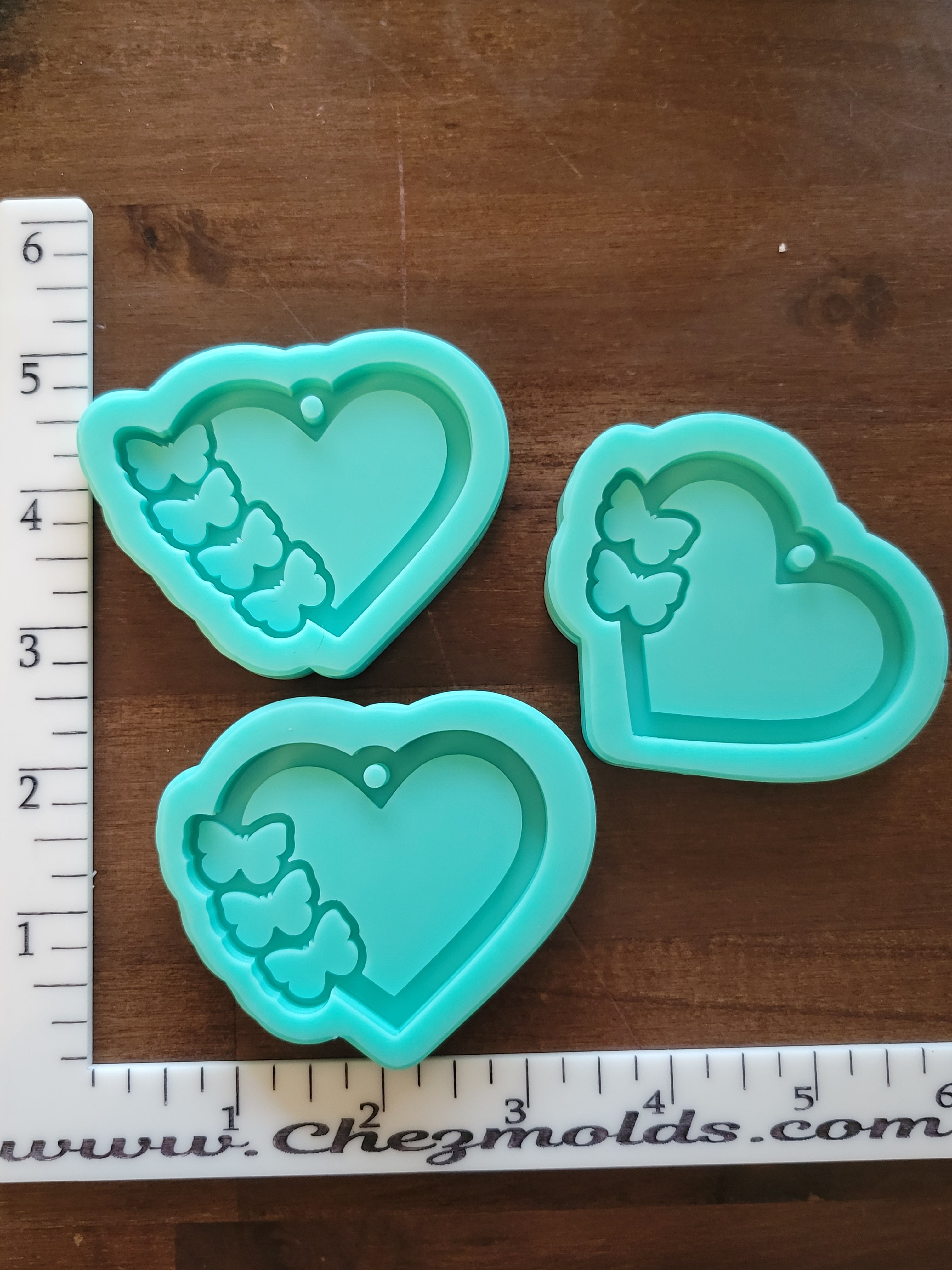 Layered heart keychain with butterfly openings – ChezMolds & More
